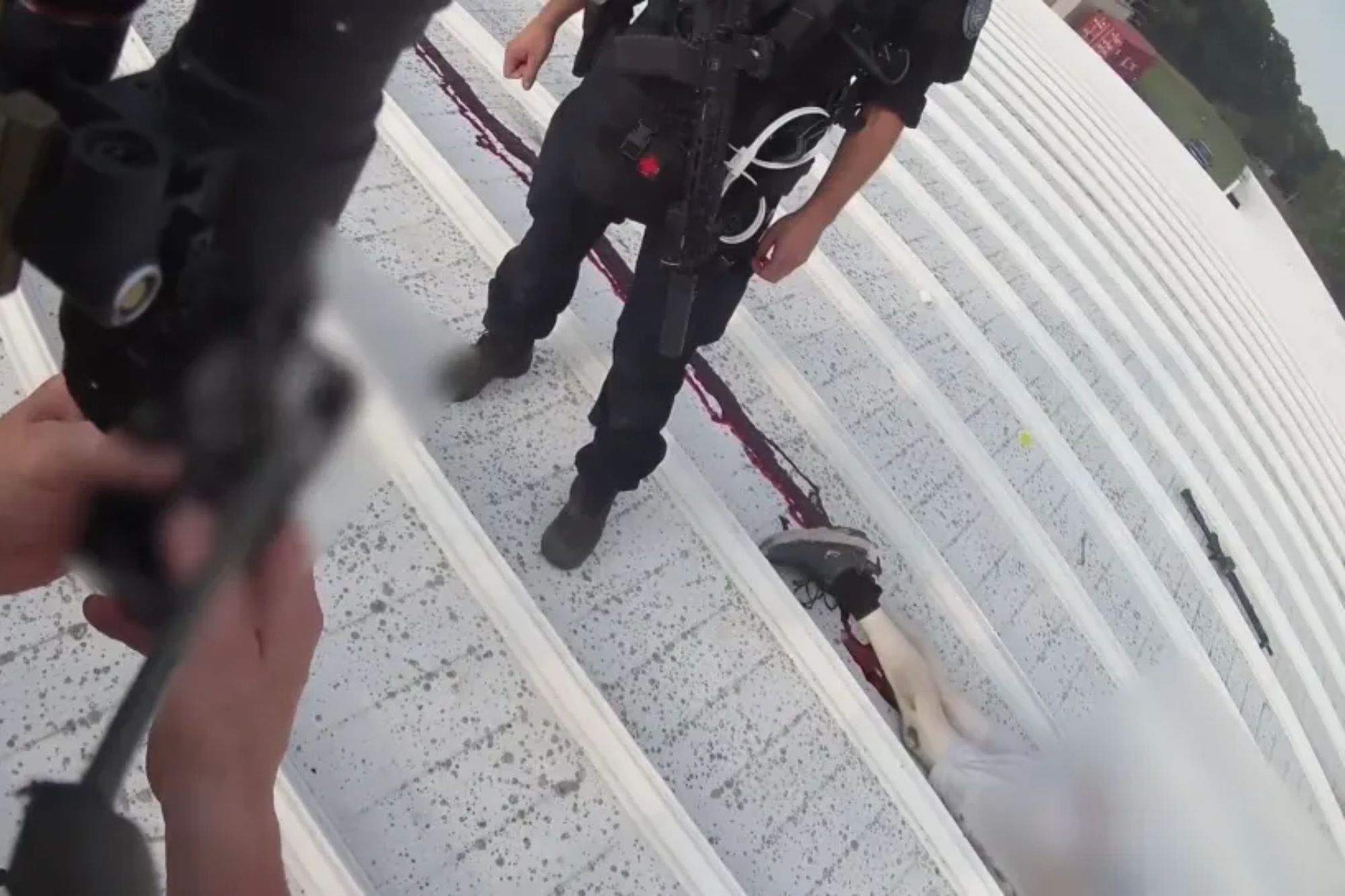 Graphic new video shows Trump gunman Thomas Matthew Crooks dead on roof ...