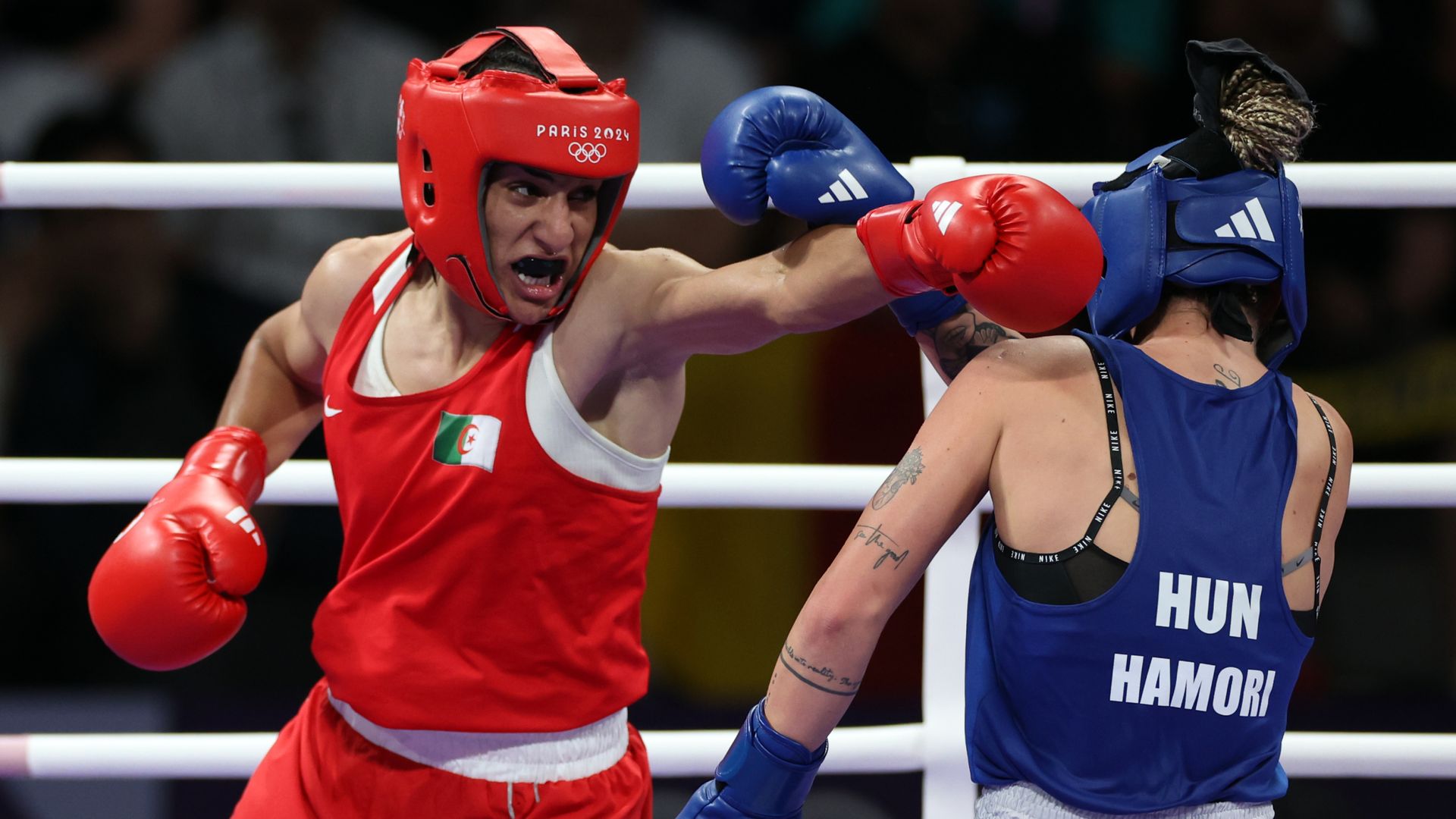 Boxer at centre of gender row guaranteed to win medal at Olympics